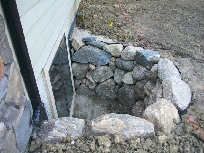 Solid Rock Landscaping LLC Window Wells | Portfolio | West Des Moines