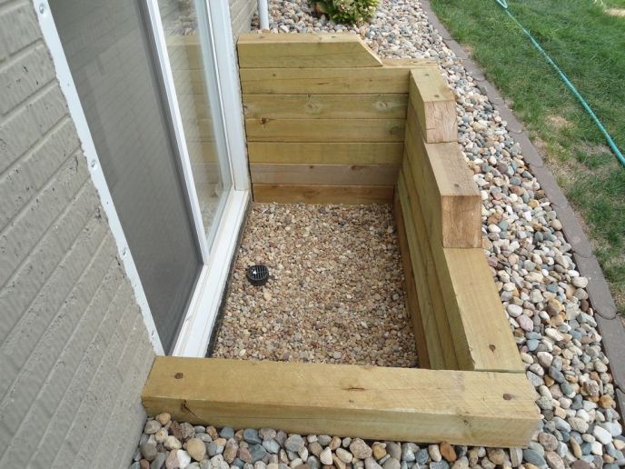 Solid Rock Landscaping LLC Window Wells | Portfolio | West Des Moines
